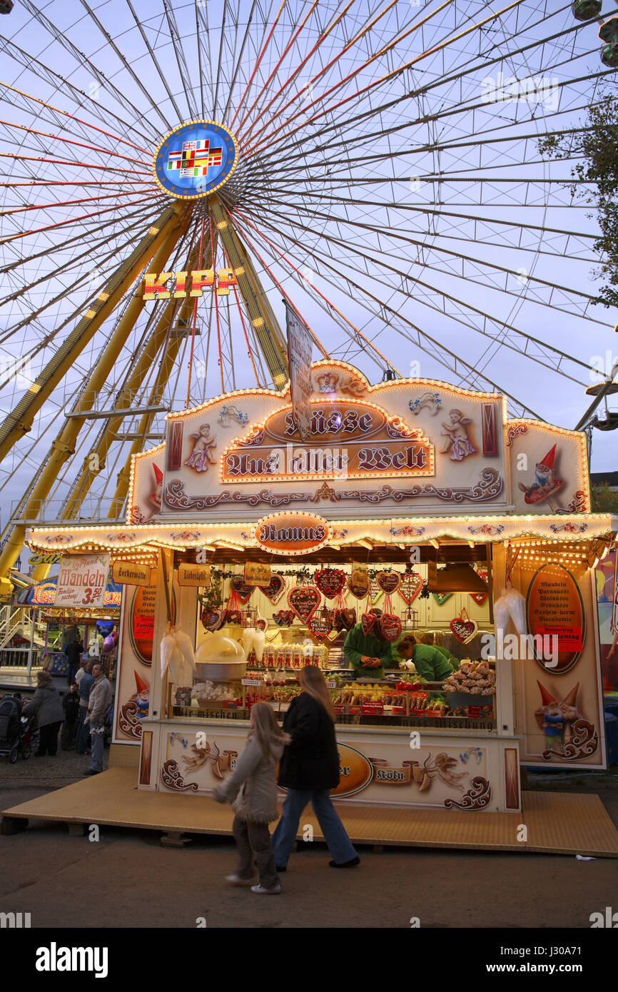 Germany, Cologne, ferris wheel on a kermis in the district Deutz, stand ...
