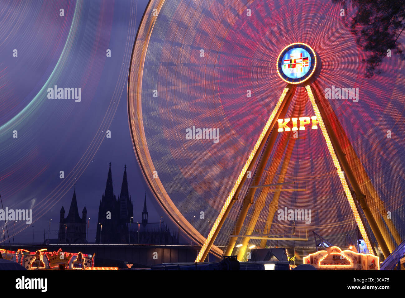 Germany, Cologne, ferris wheel on a kermis in the district Deutz, view ...