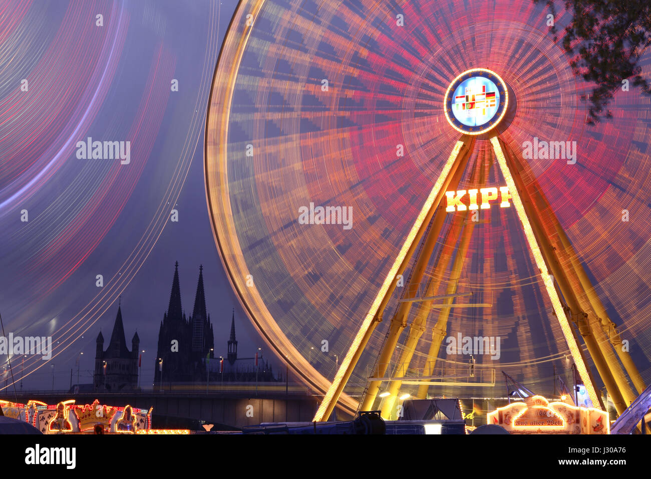 Germany, Cologne, ferris wheel on a kermis in the district Deutz, view ...