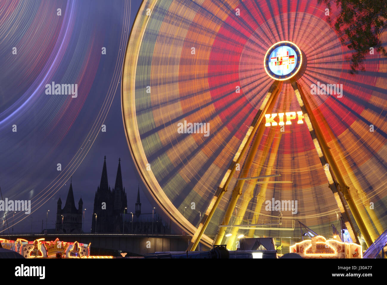 Germany, Cologne, ferris wheel on a kermis in the district Deutz, view ...