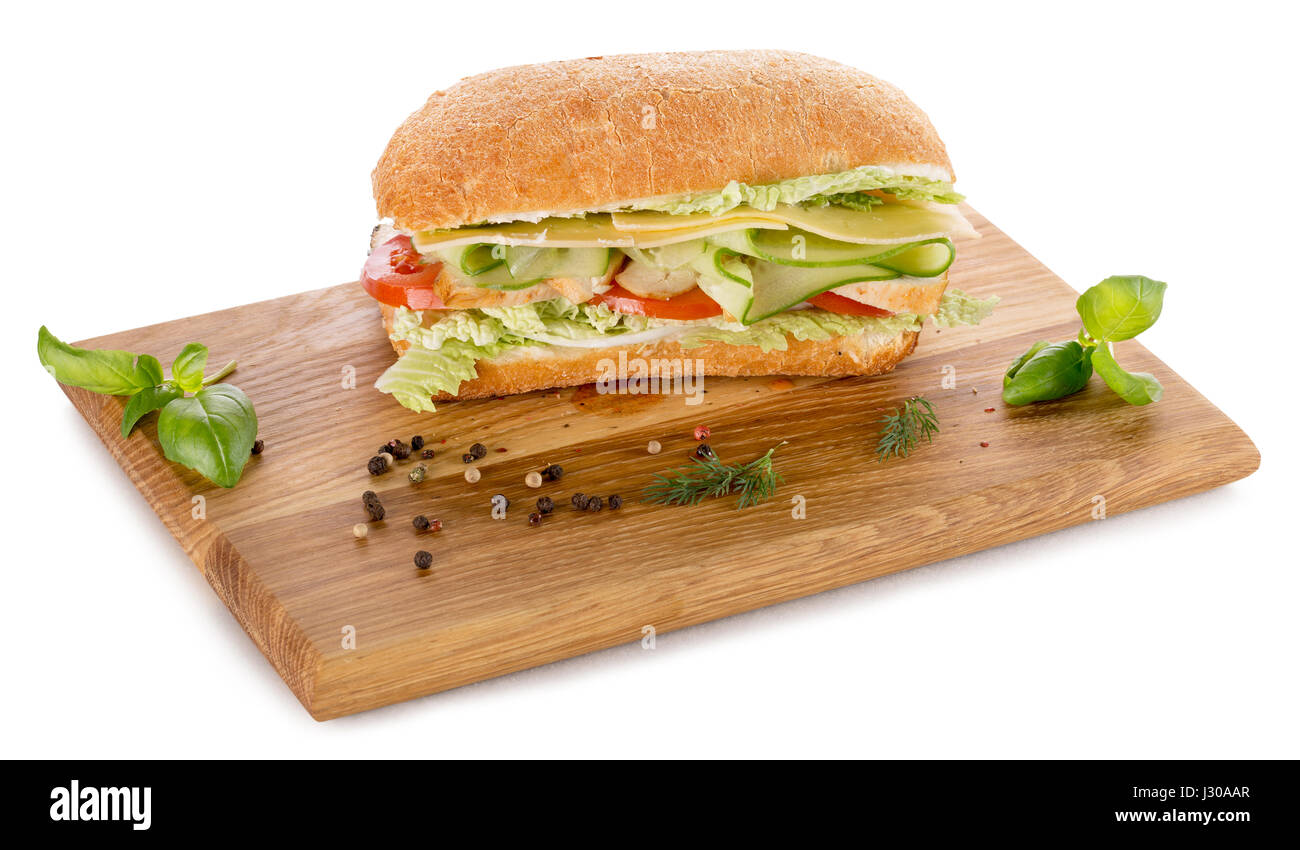 long sandwich on a wooden background Stock Photo - Alamy