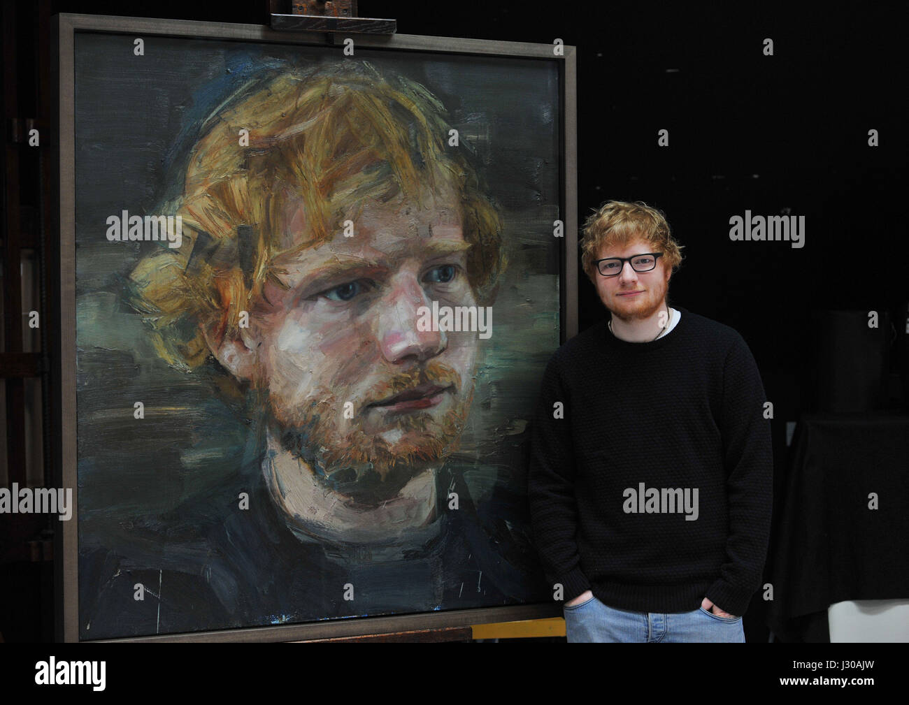Ed Sheeran with portrait by Belfast-based artist Colin Davidson at the ...