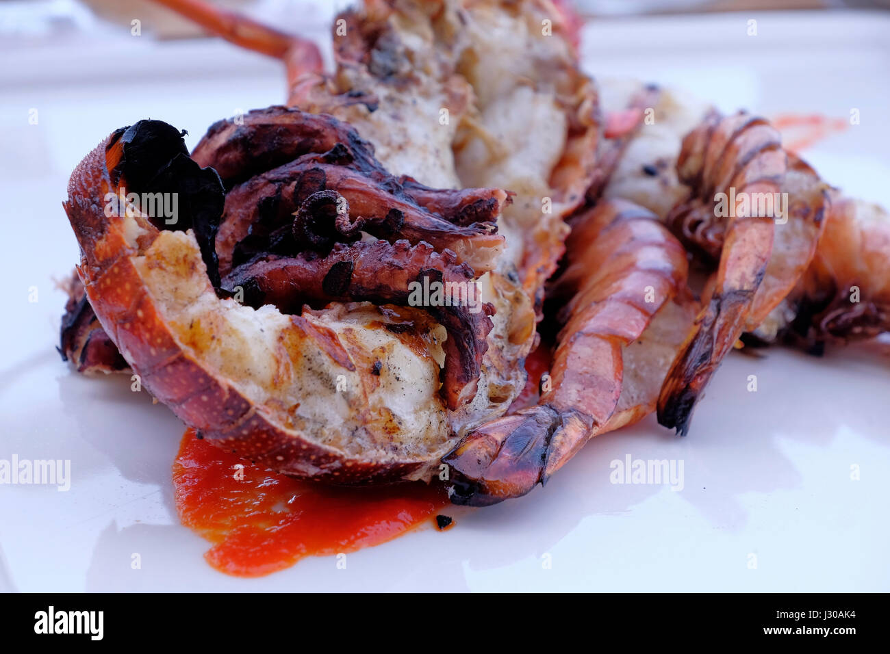 Lobster and squid served at the Diamonds Mequfi Beach Resort in ...