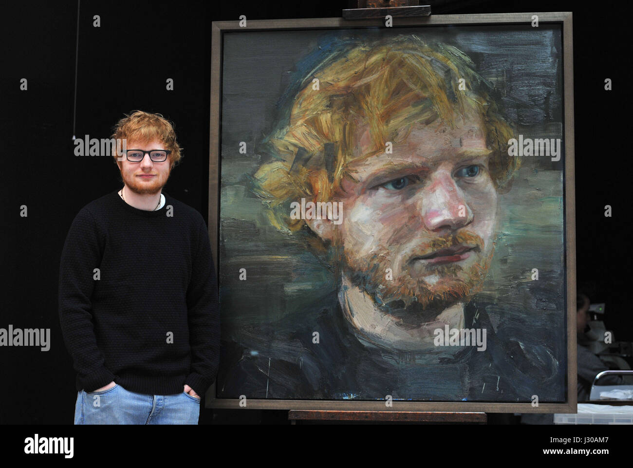 Ed Sheeran with portrait by Belfast-based artist Colin Davidson at the ...