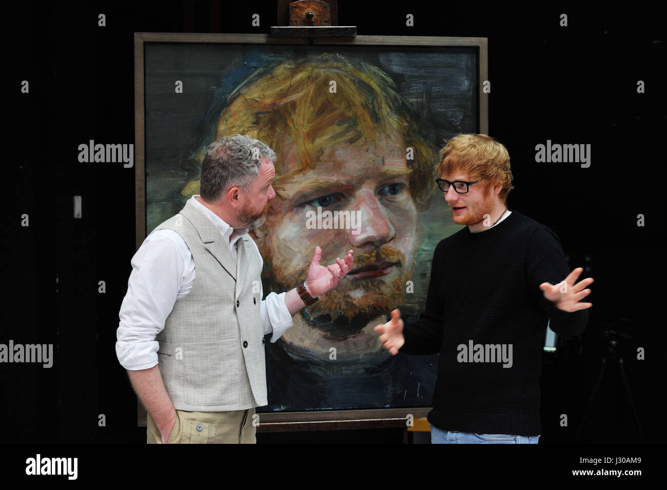 Ed Sheeran with portrait by Belfast-based artist Colin Davidson (left ...