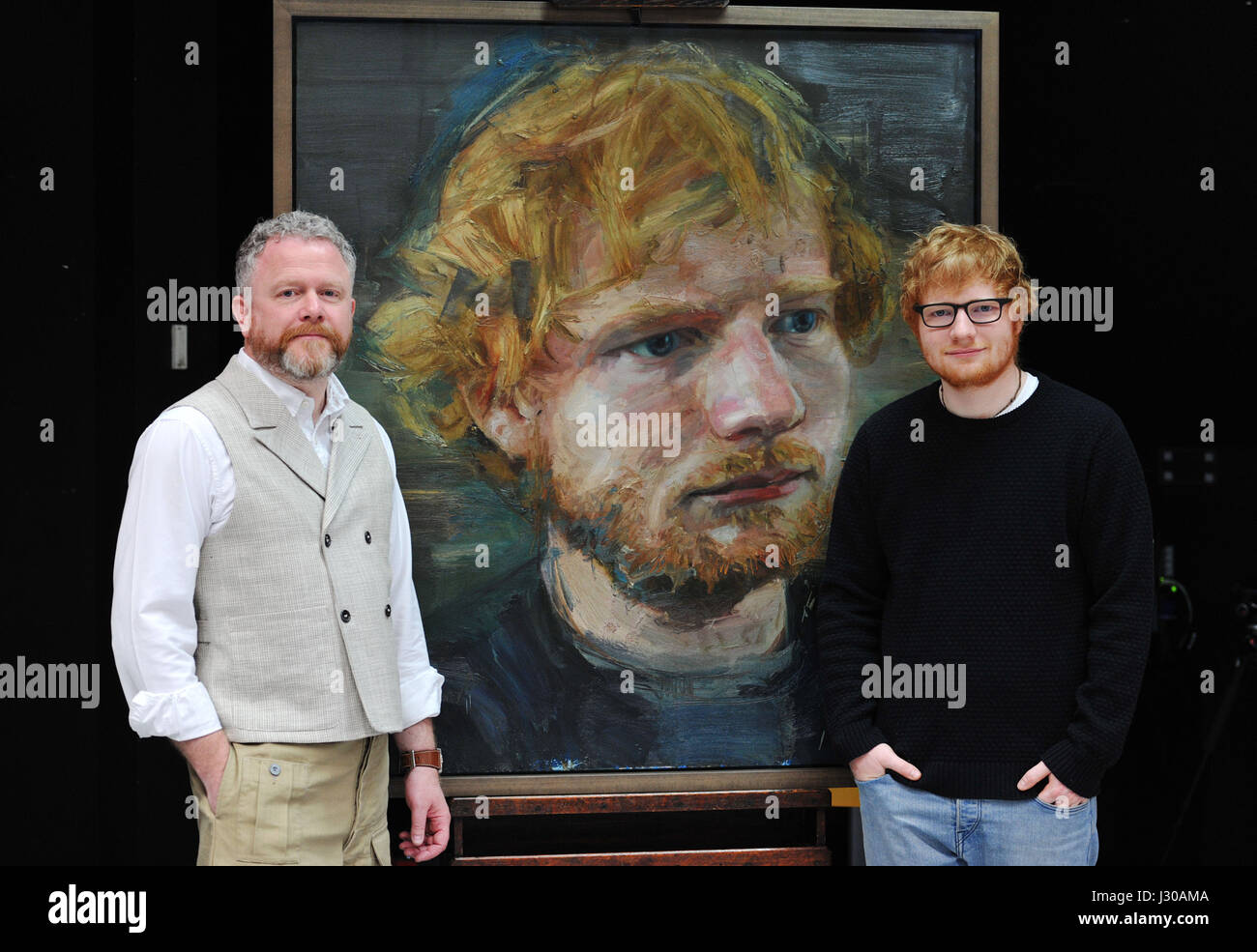 Ed Sheeran with portrait by Belfast-based artist Colin Davidson (left ...
