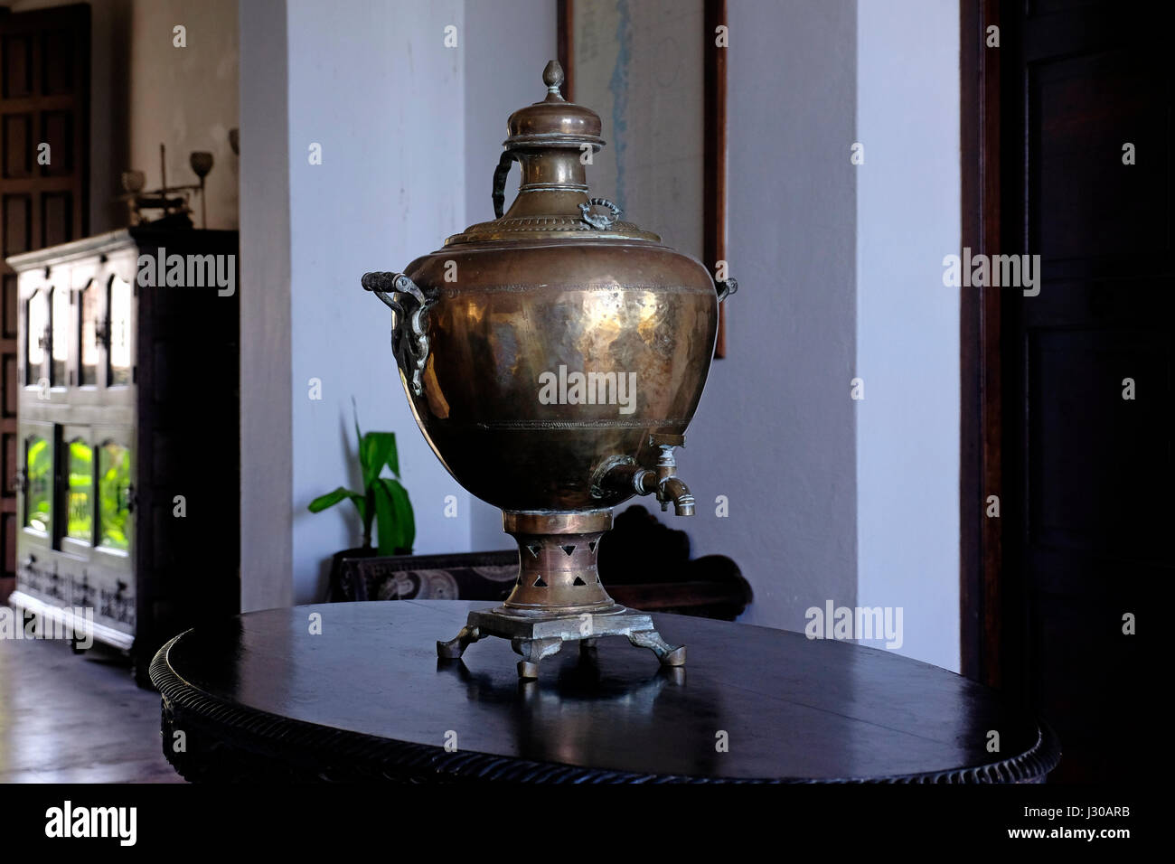 Copper water tank with lockable tap Stock Photo - Alamy