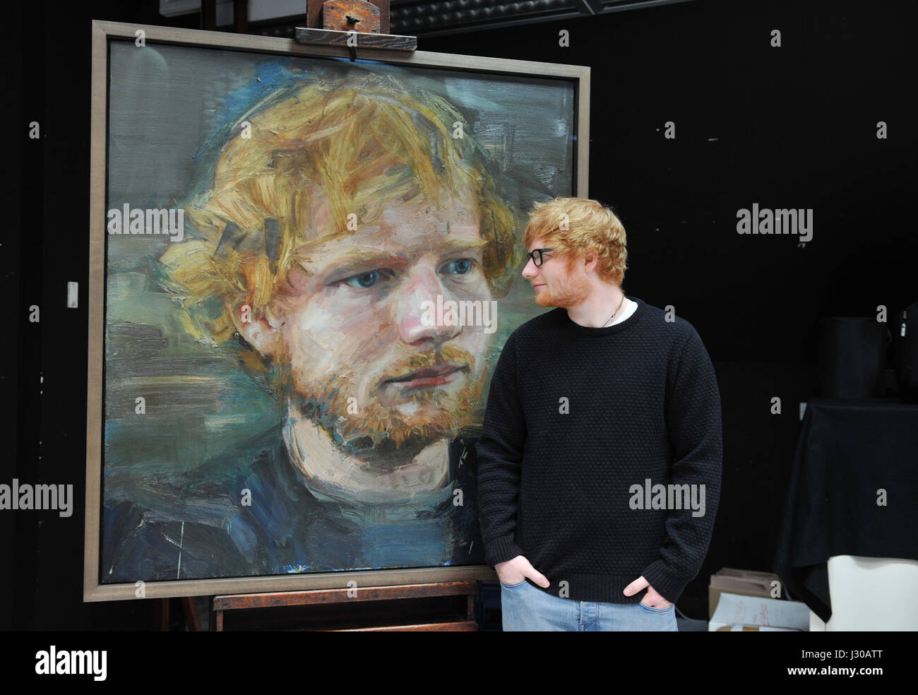 Ed Sheeran with portrait by Belfast-based artist Colin Davidson at the ...