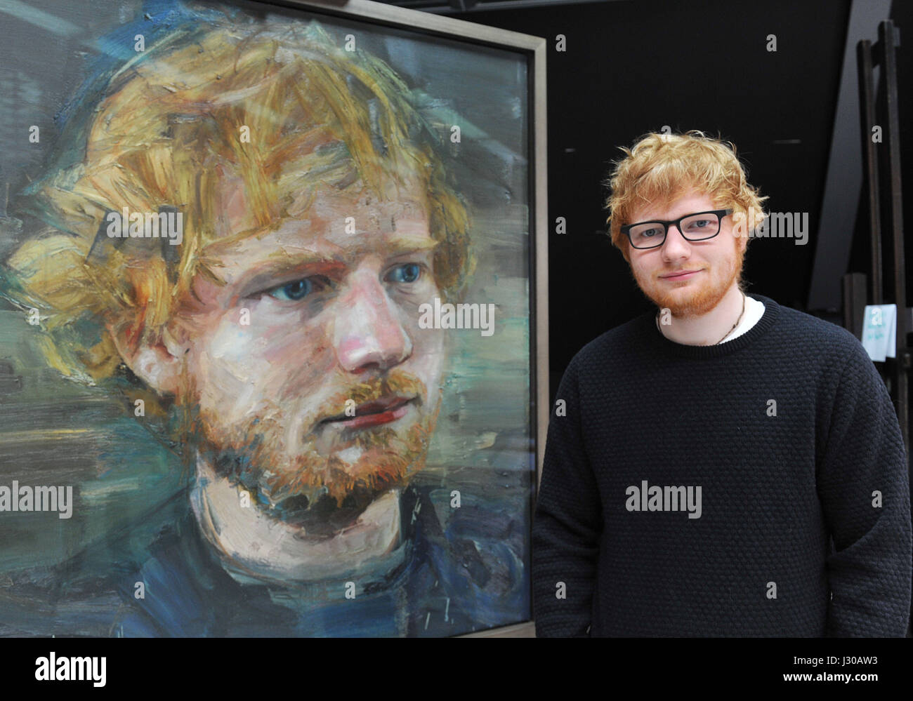 Ed Sheeran with portrait by Belfast-based artist Colin Davidson at the ...