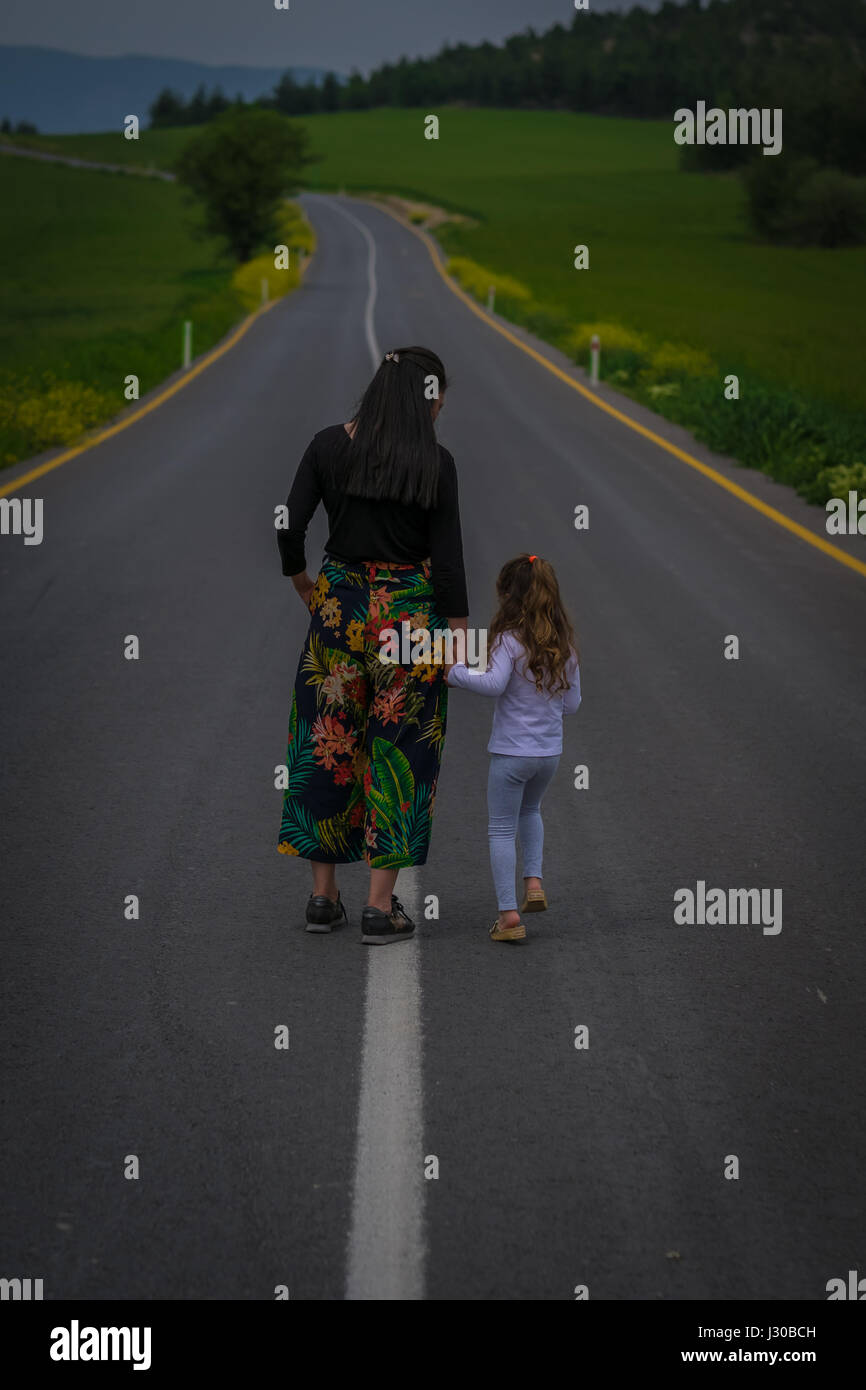 mother and daughter in the road Stock Photo - Alamy