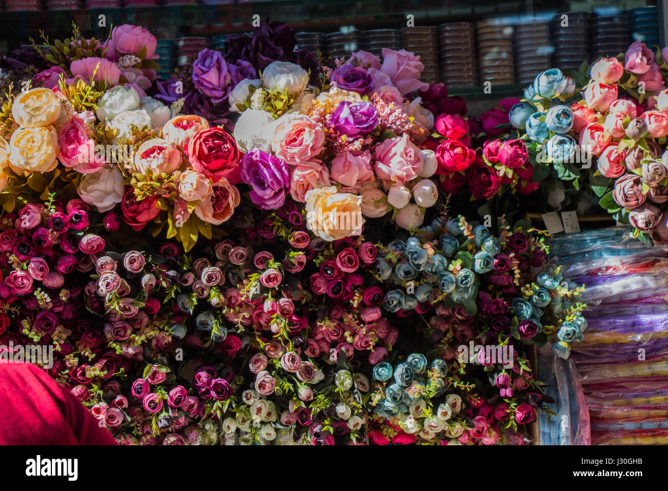 Fake colorful flowers for decorative purposes Stock Photo - Alamy