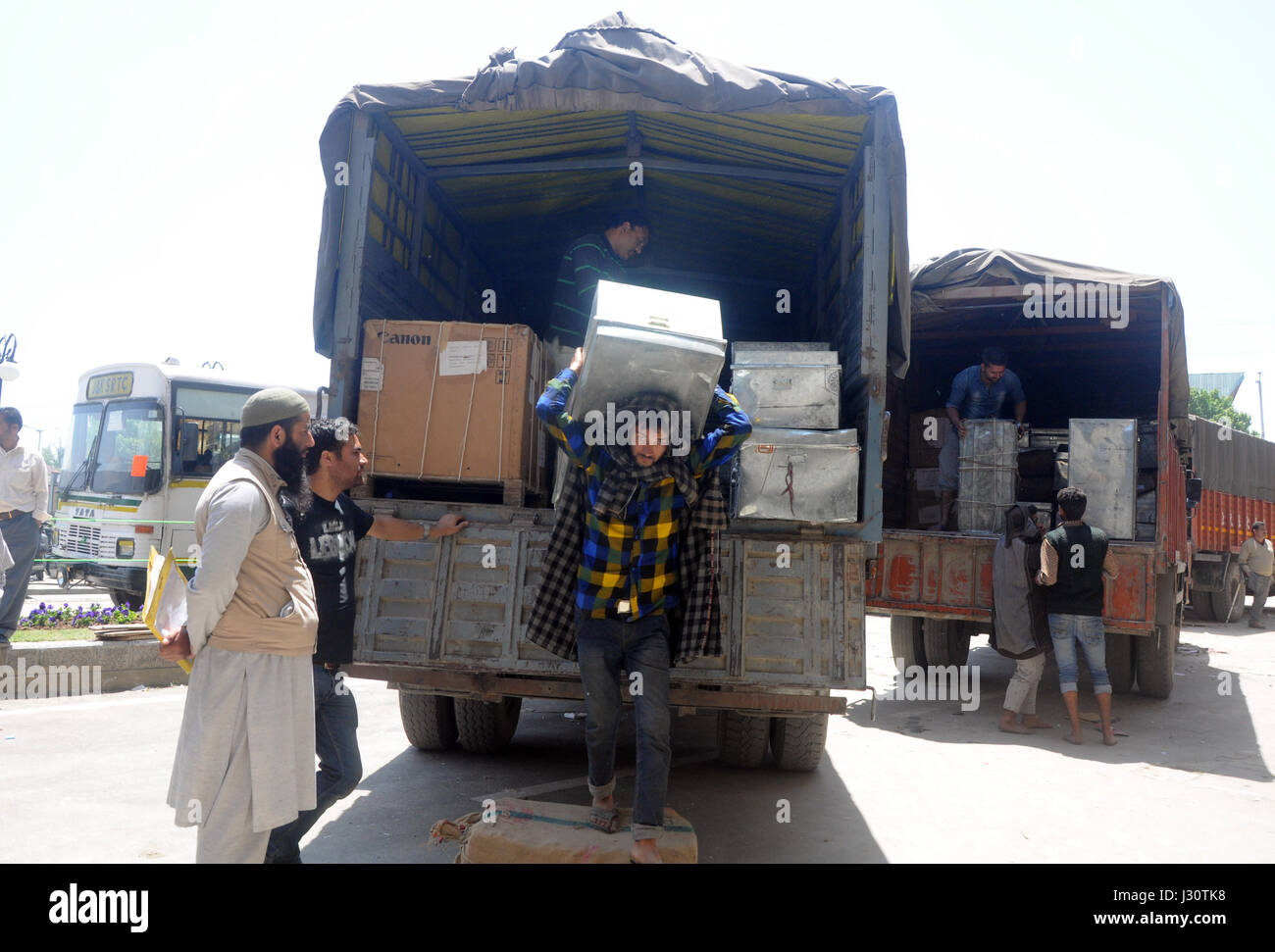 As world observes International Labor Day, a Kashmiri Muslim laborers ...