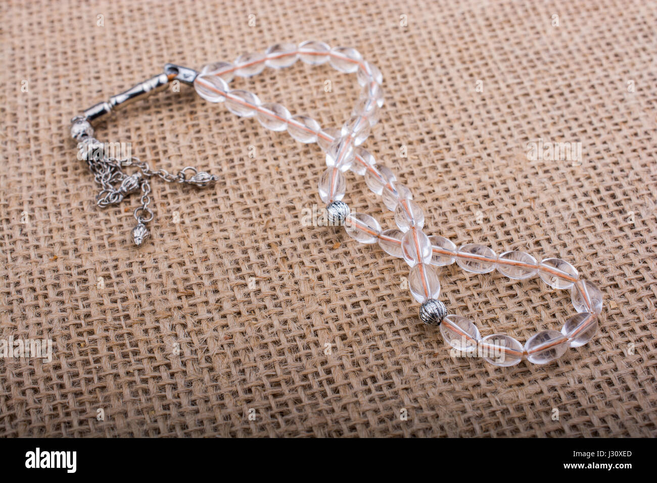 Praying beads of the certain color Stock Photo - Alamy
