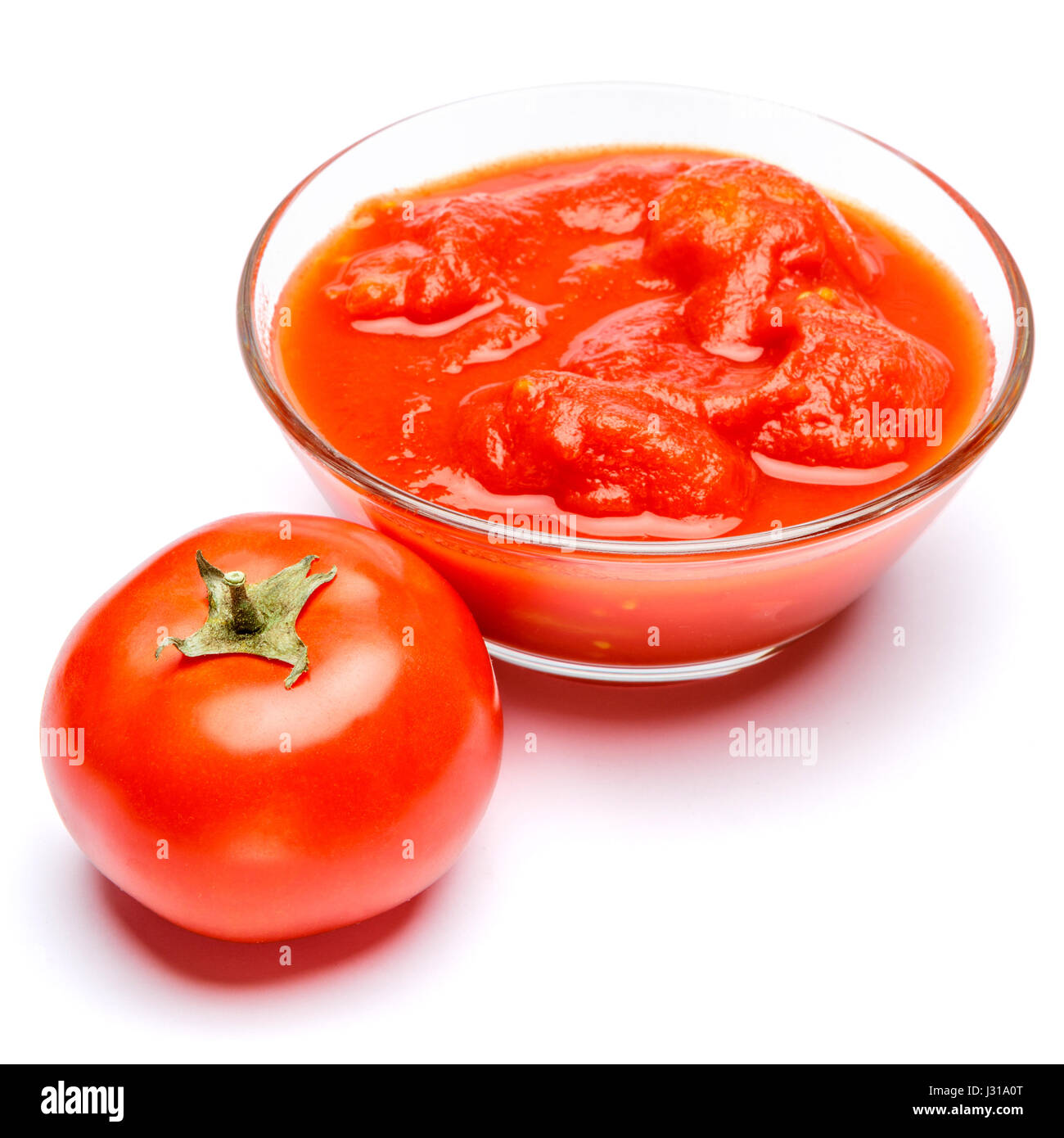 Small glass condiment bowl of red tomato sauce ketchup of peree Stock ...