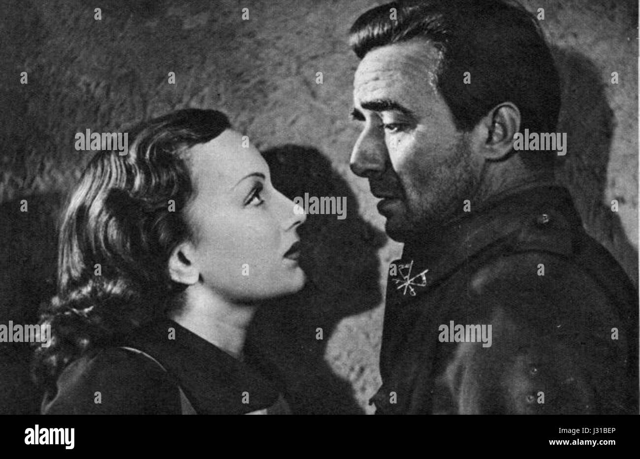 Mireille Balin and Fosco Giachetti are featured in a scene from the ...