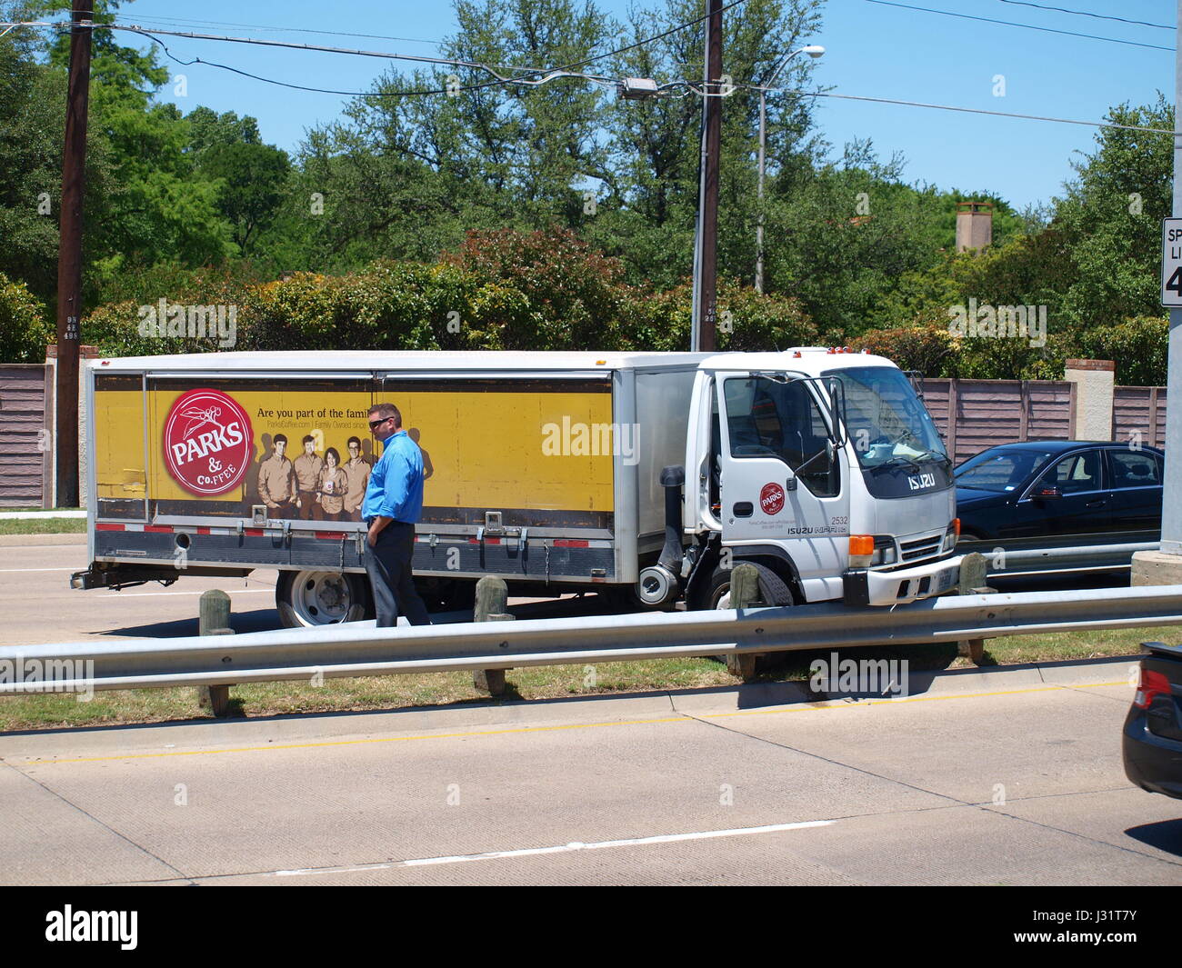 Car turning left intersection hi-res stock photography and images - Alamy