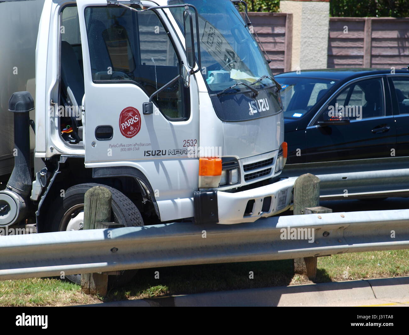 Car turning left intersection hi-res stock photography and images - Alamy
