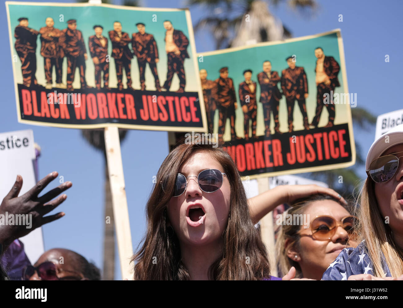 Los Angeles, California, USA. 1st May, 2017. Protesters carry signs ...