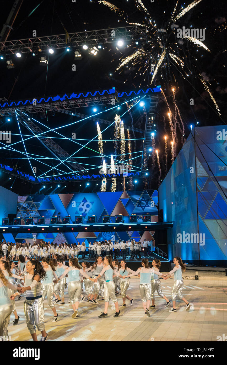 Jerusalem, Israel. 01st May, 2017. A group of dancers with fireworks in ...