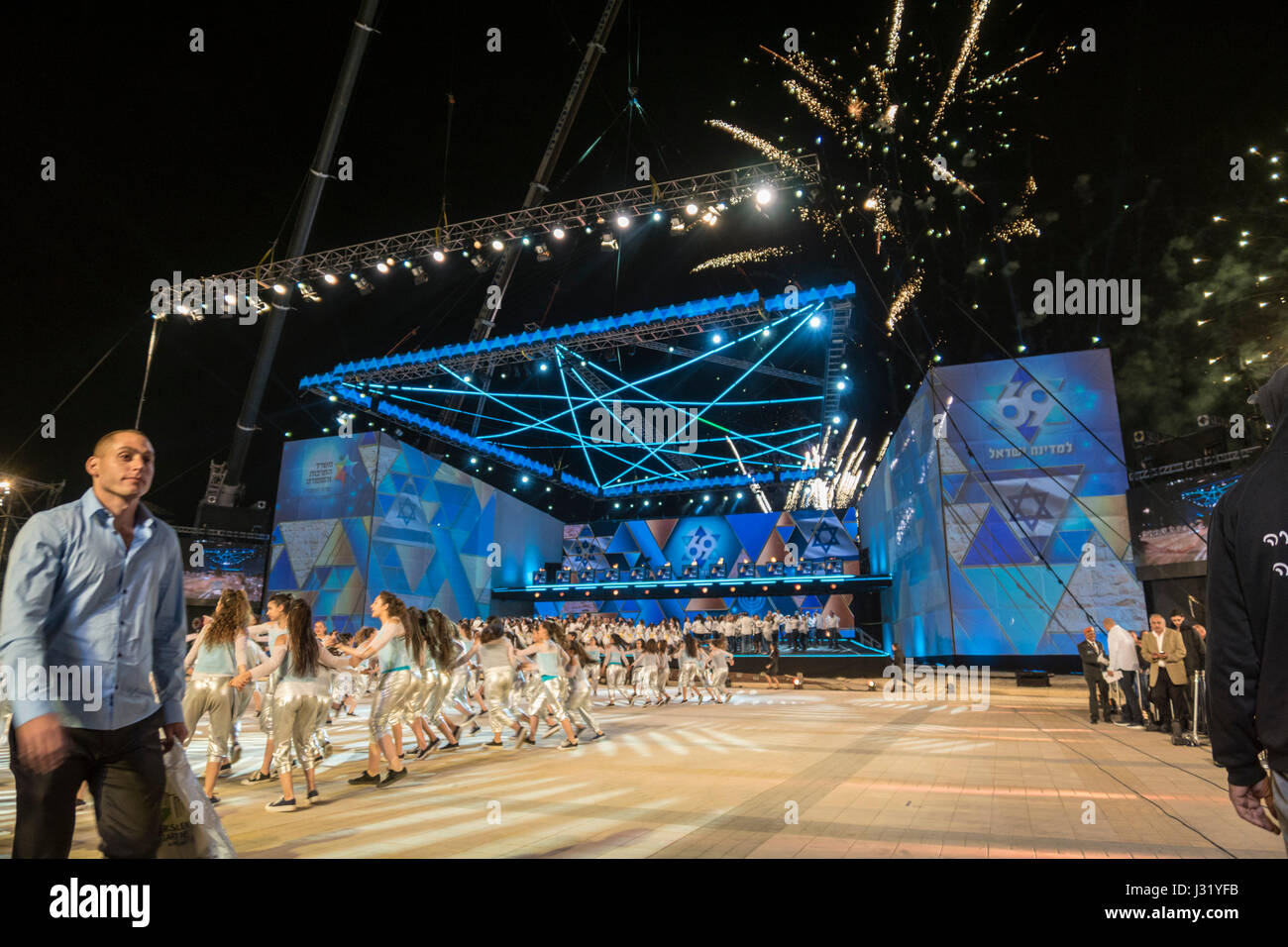 Jerusalem, Israel. 01st May, 2017. A group of dancers with fireworks in ...