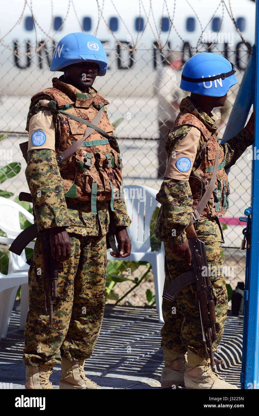 Ugandan UN soldiers patrol the airport in the International Security ...