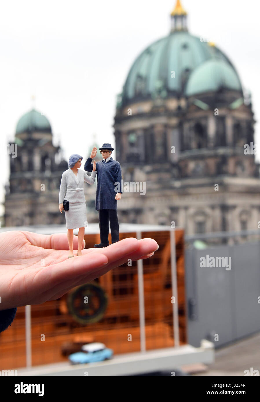 A miniature model of the Palace of the Republic with a model of a ...