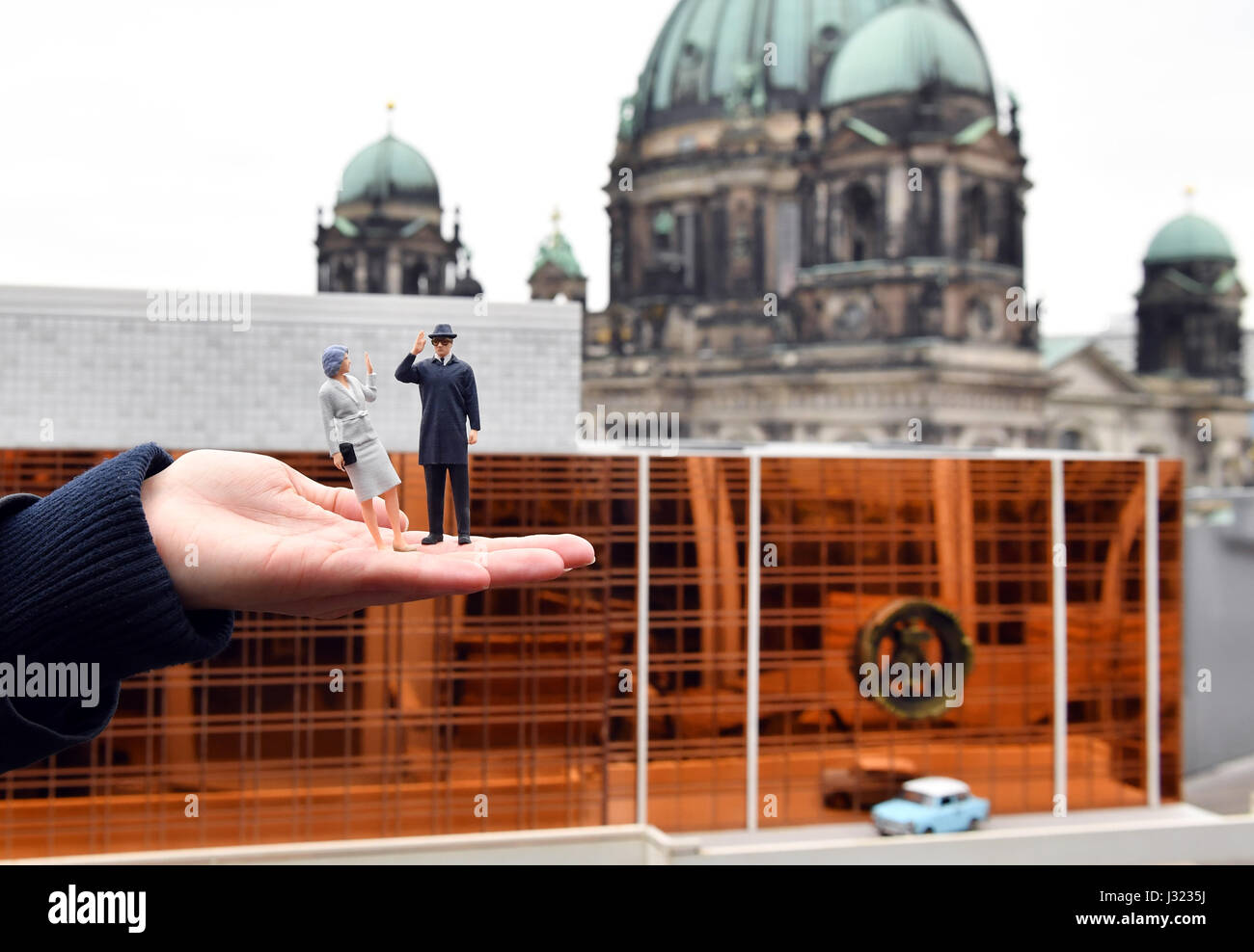 A miniature model of the Palace of the Republic with a model of a ...