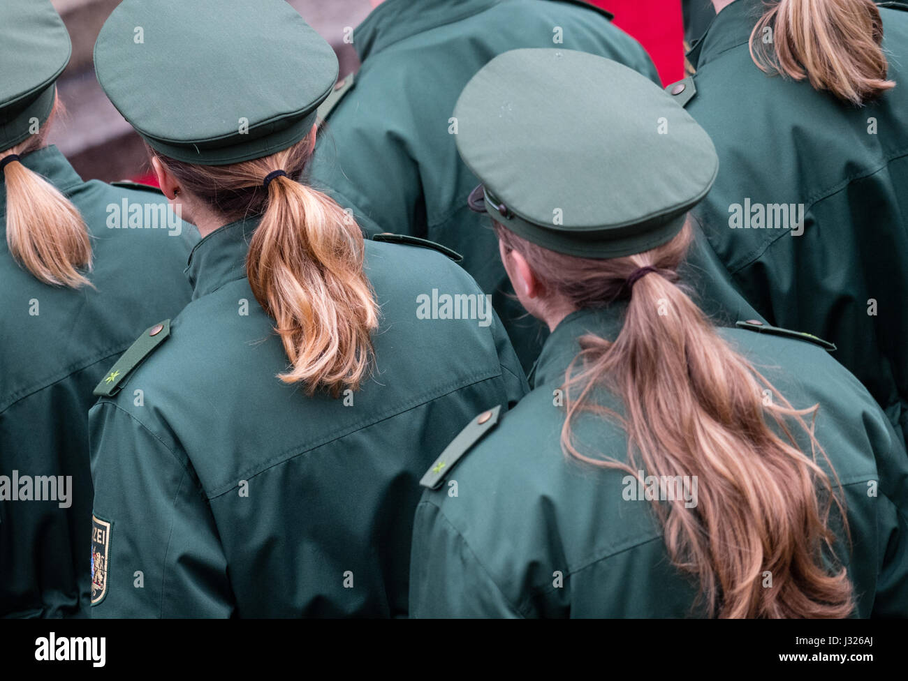 Munich, Germany. 26th Apr, 2017. Policewomen stand in an honourary ...