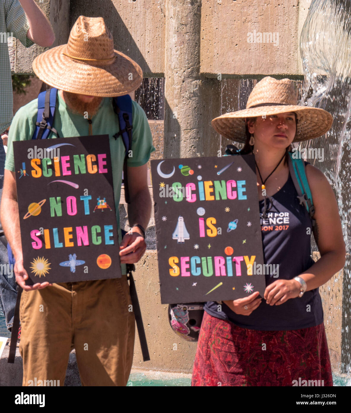 Participants with protest signs at rally/march for Science on Earth Day ...