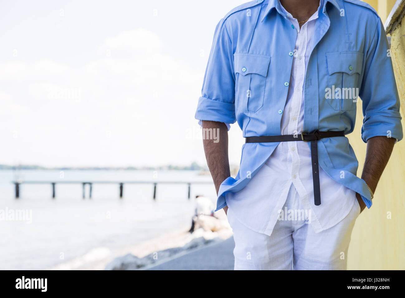 Handsome Indian man posing in a vacation context. Street fashion and ...