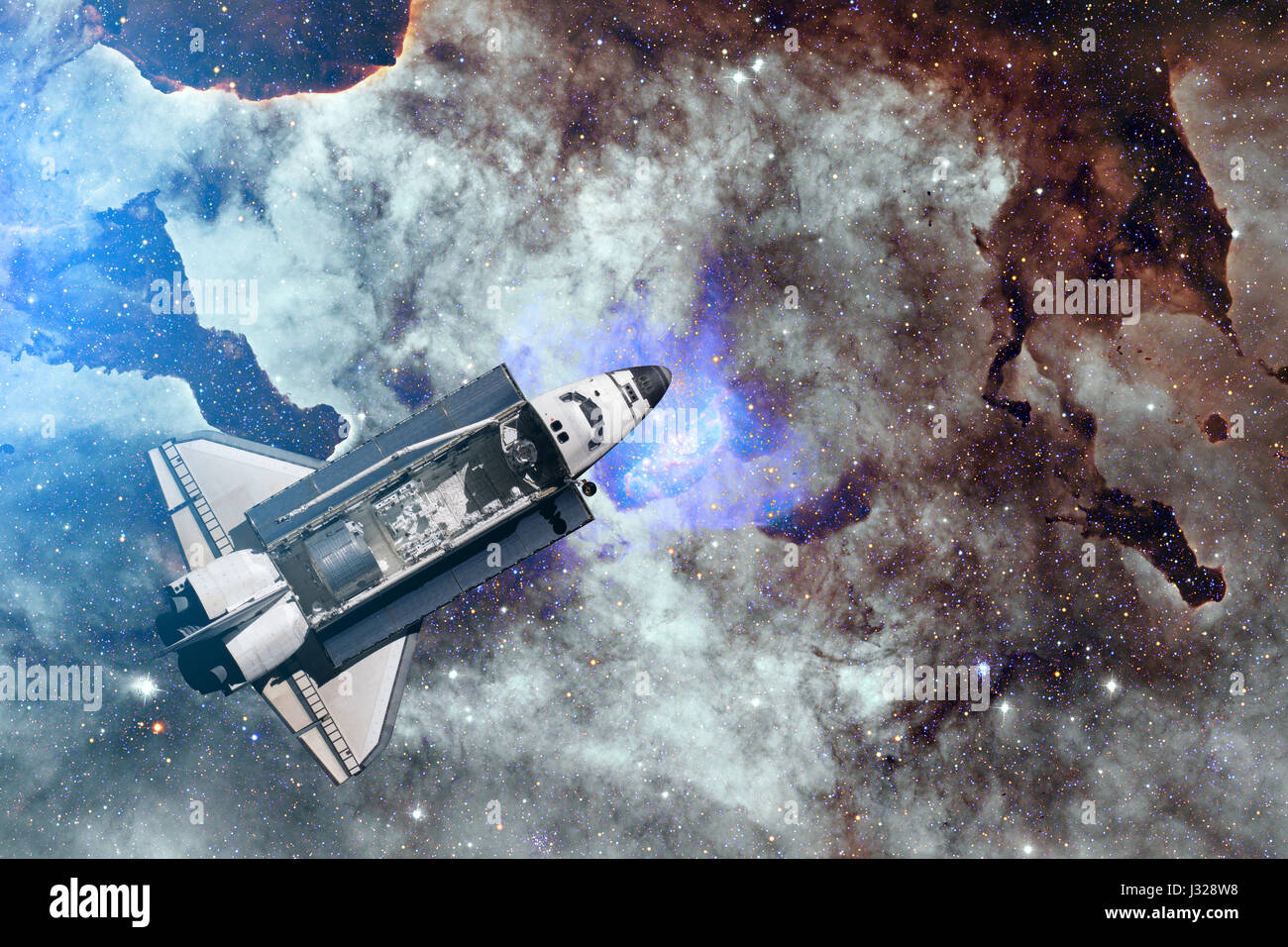 Space Shuttle flight over space nebula Stock Photo - Alamy