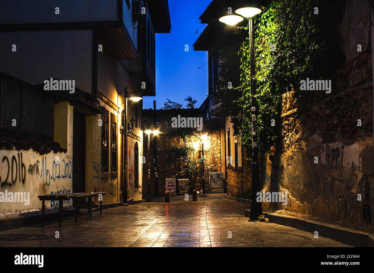 Old city street, stone stairway, lights at night. Kaleici, Antalya ...