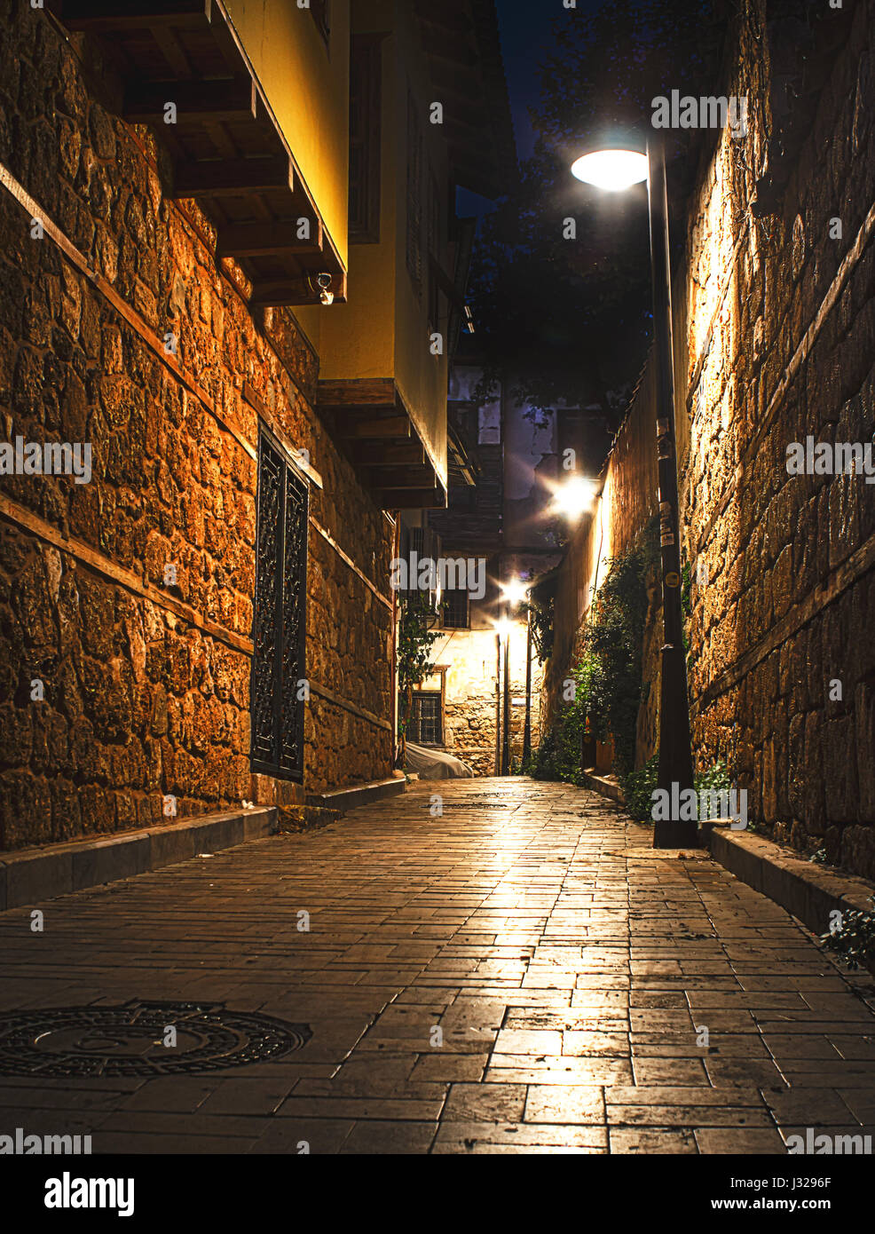 Old city street, stone stairway, lights at night. Kaleici, Antalya ...