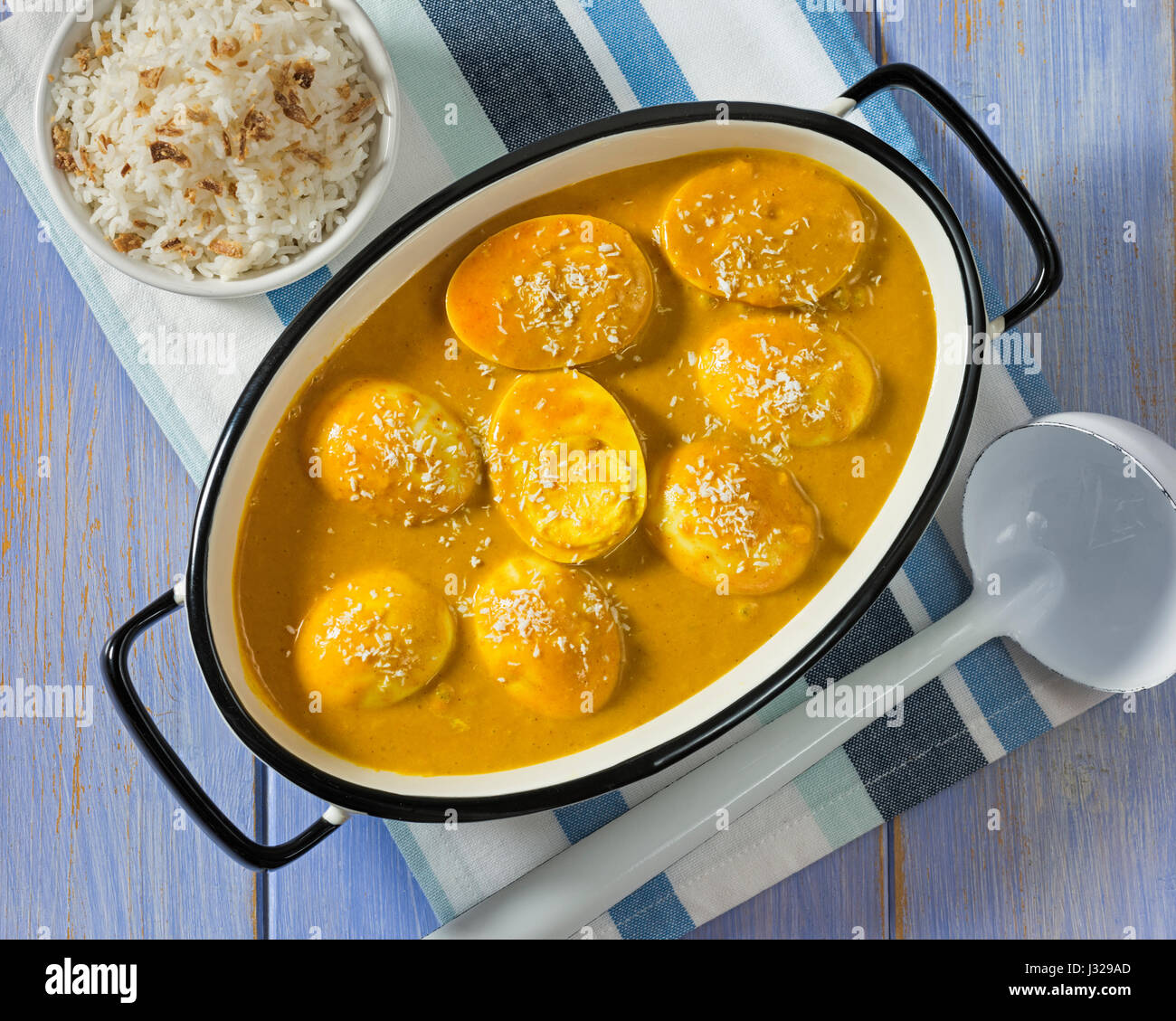Curried eggs and rice Stock Photo - Alamy