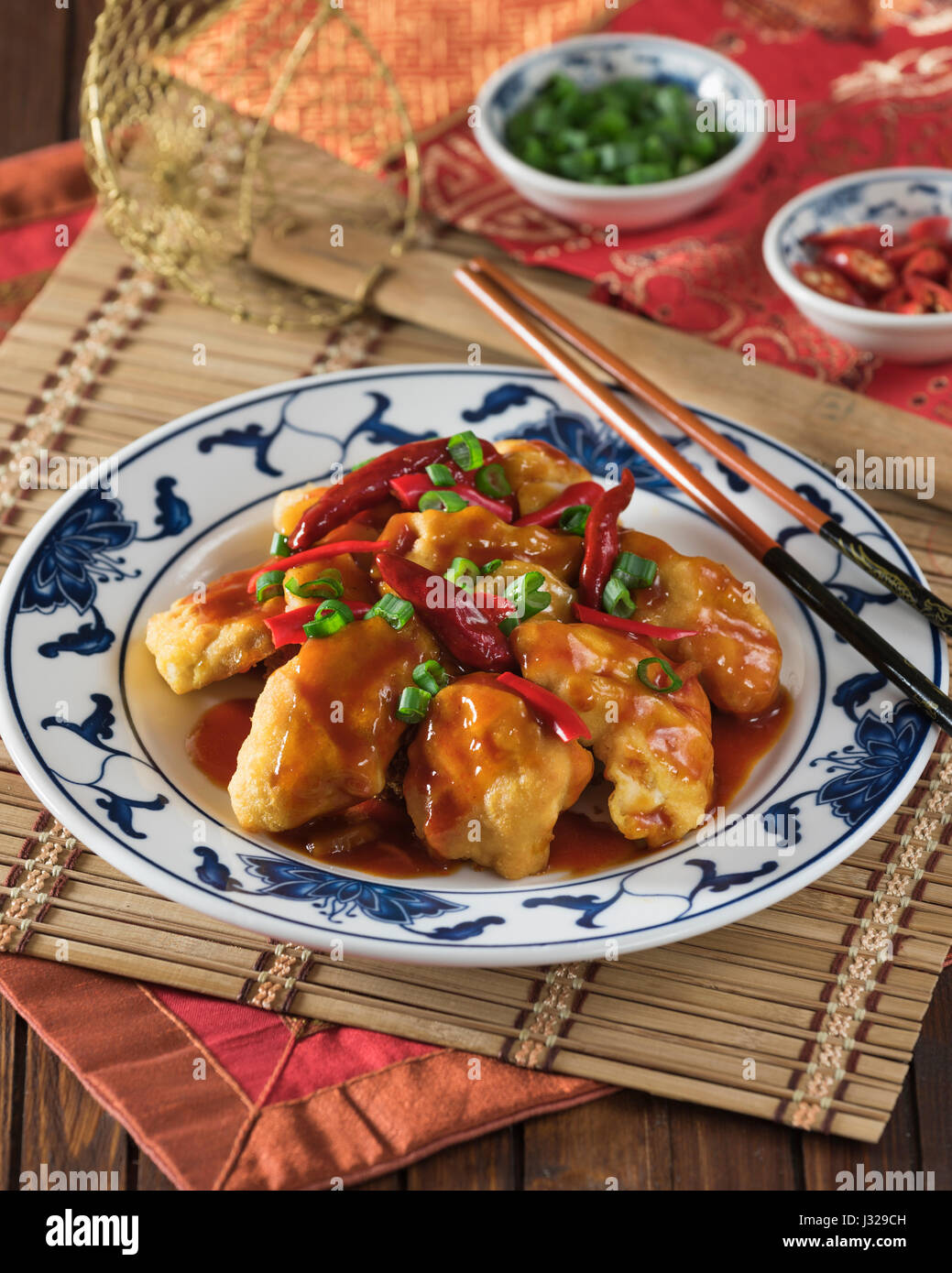 Firecracker chicken. Spicy fried chicken in a hot chilli sauce. Chinese ...