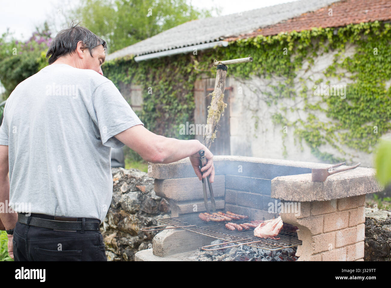 Old man eating meat hi-res stock photography and images - Alamy