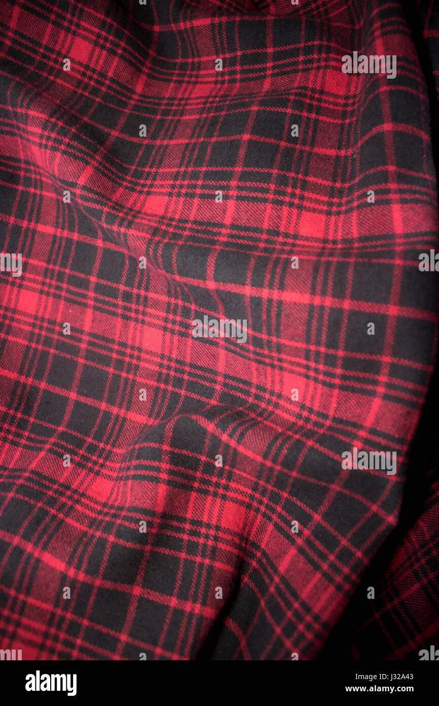 Red plaid flannel fabric cloth tartan garment textile Stock Photo - Alamy