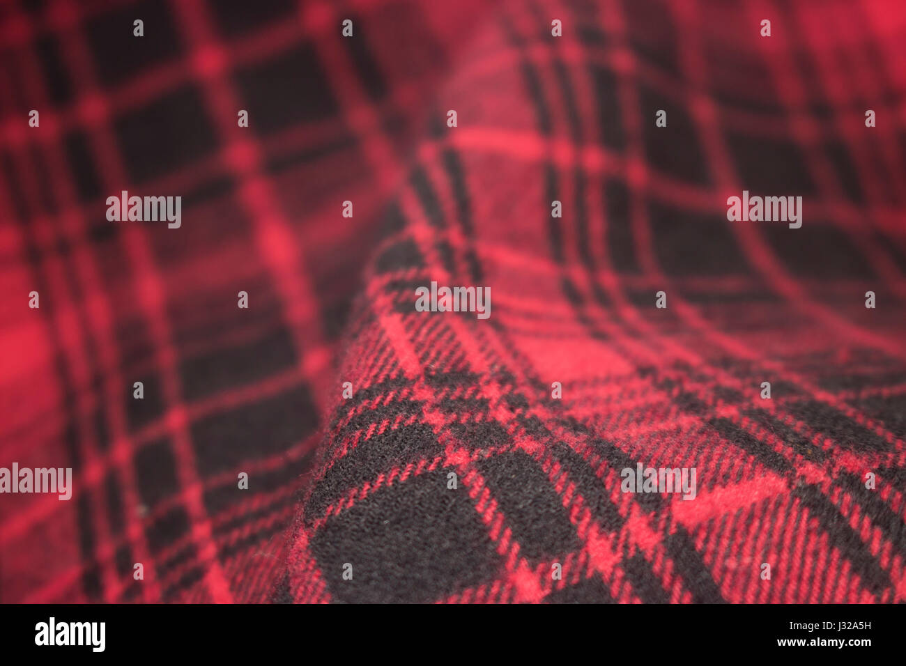 Red plaid flannel fabric cloth tartan garment textile Stock Photo - Alamy