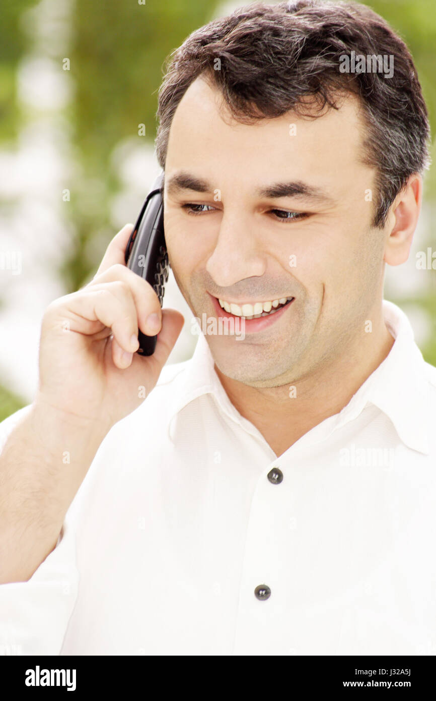 Man speaking on phone Stock Photo - Alamy