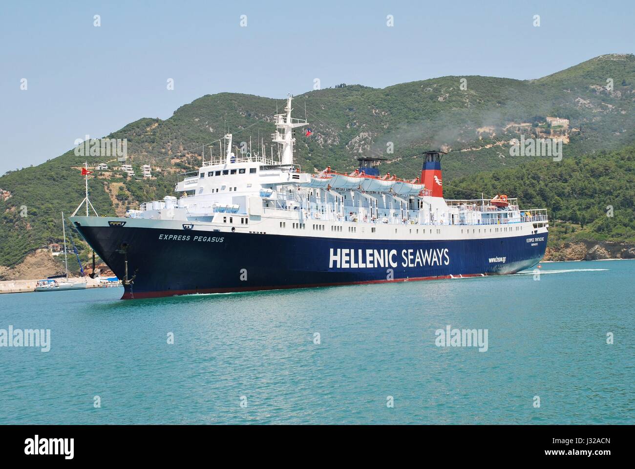 Hellenic Seaways ferry boat Express Pegasus docking at Chora on the ...