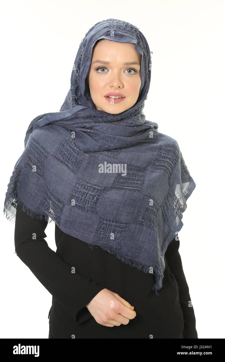 Young muslim woman posing at studio Stock Photo - Alamy