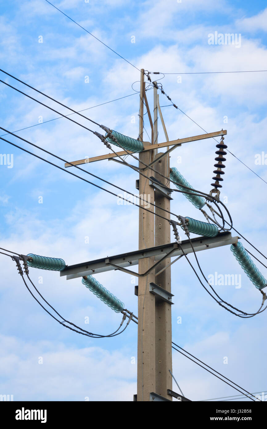Electric pole with blue sky and white cloud Stock Photo - Alamy