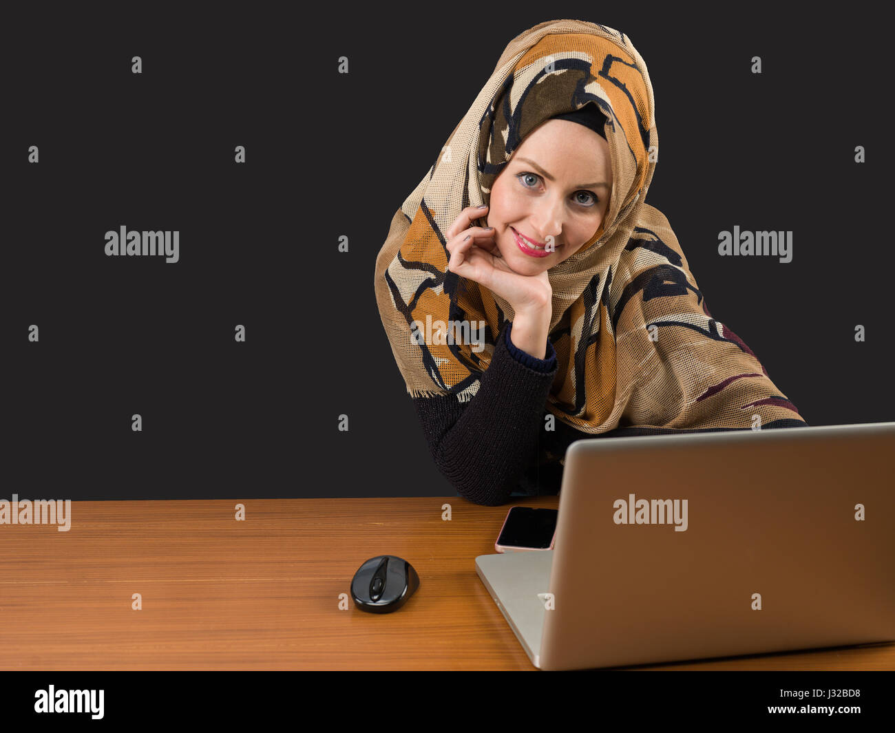 Young muslim woman at work Stock Photo - Alamy