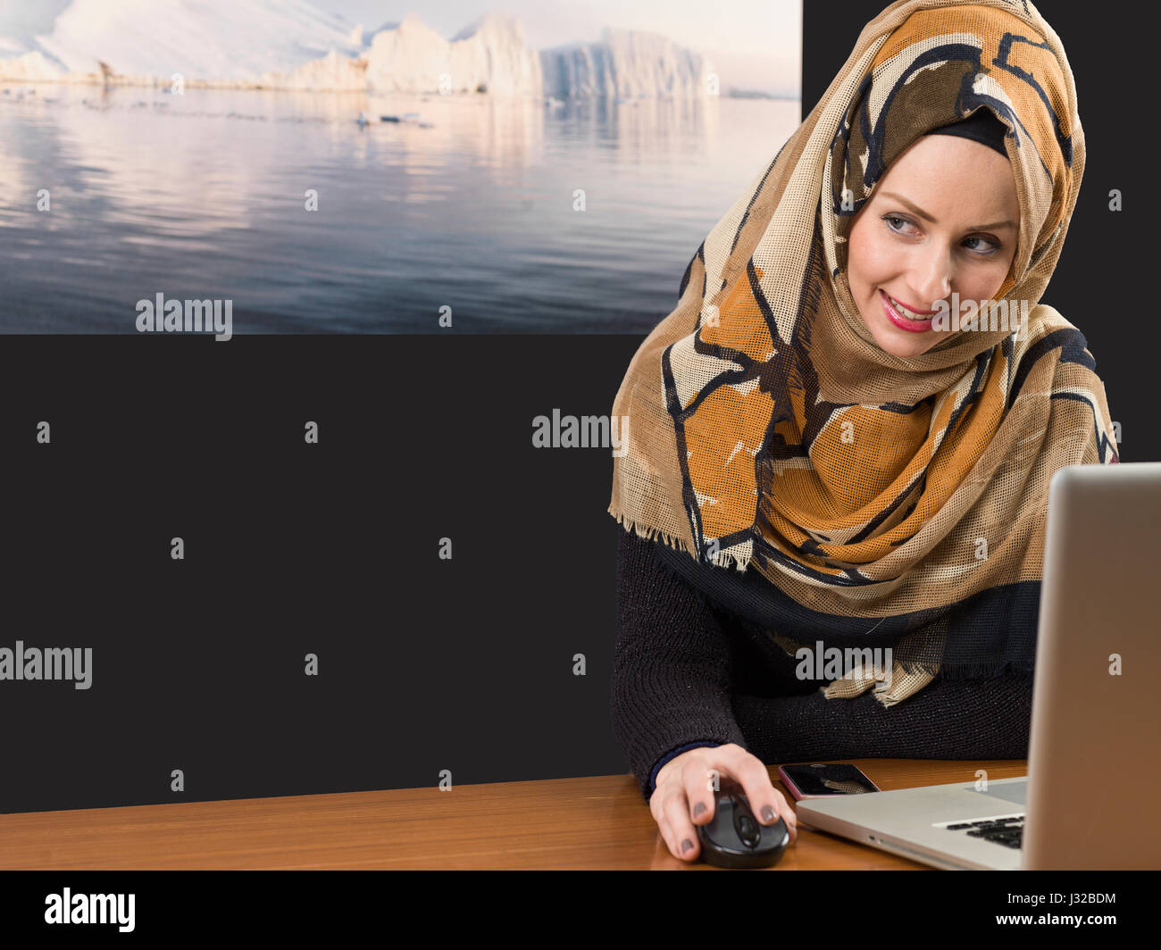 Young muslim woman at work Stock Photo - Alamy