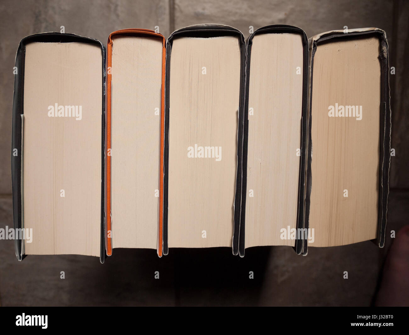 Stack of hardback books from a high angled view Stock Photo - Alamy