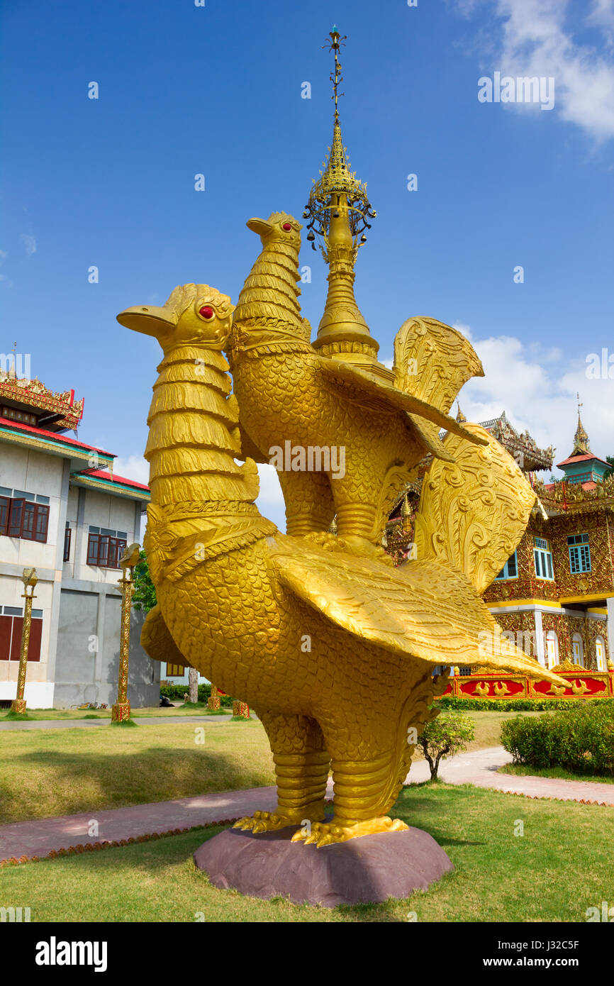 Golden bird statue in Wat Thai Wat Tha Na Ram temple in Mae sot, Tak ...