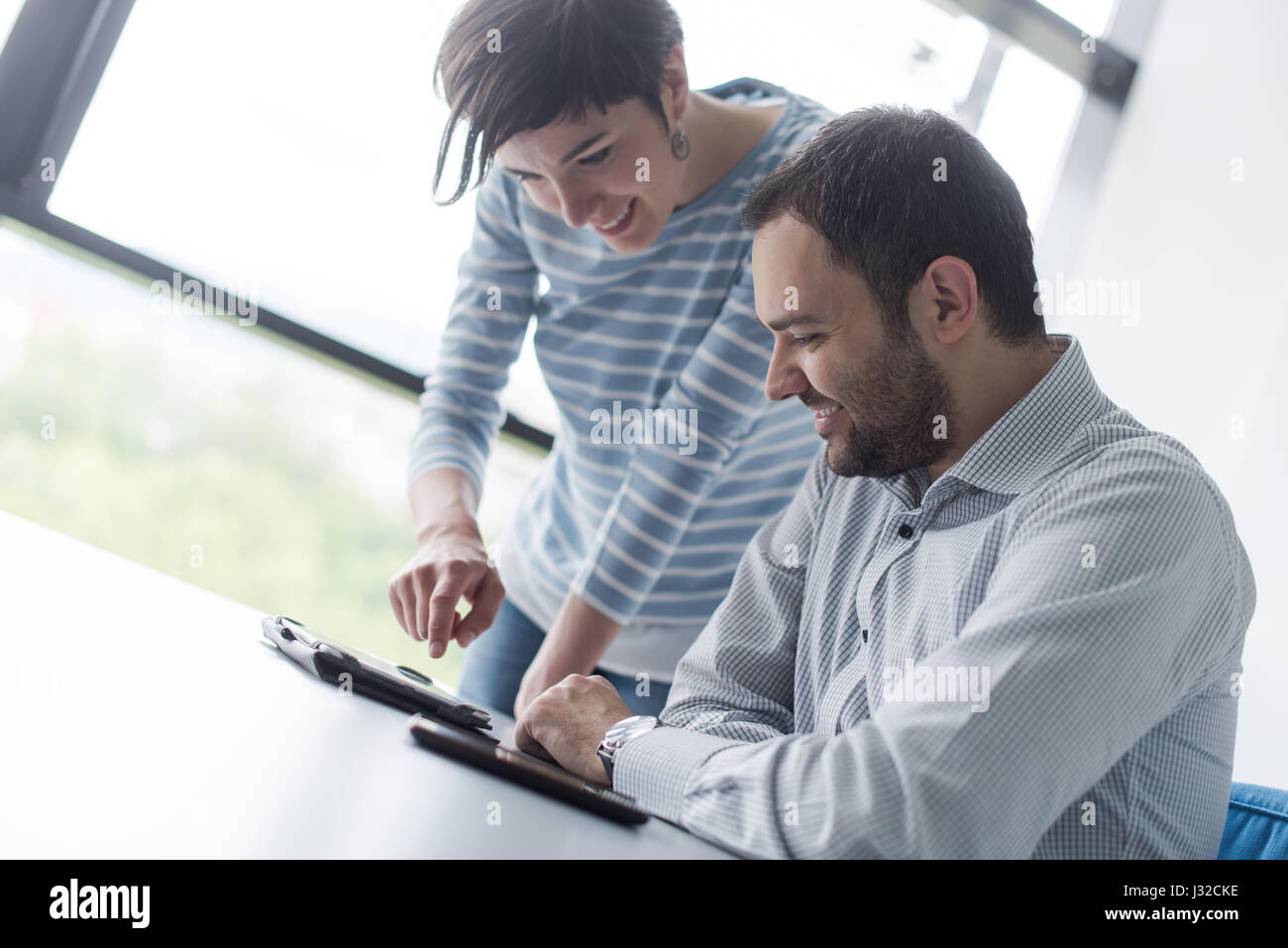 two business people preparing for next meeting and discussing ideas ...