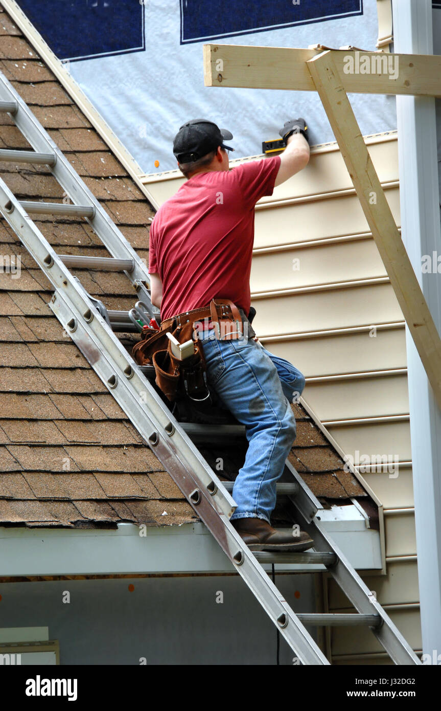 Carpenter using hammer outside hi-res stock photography and images - Alamy
