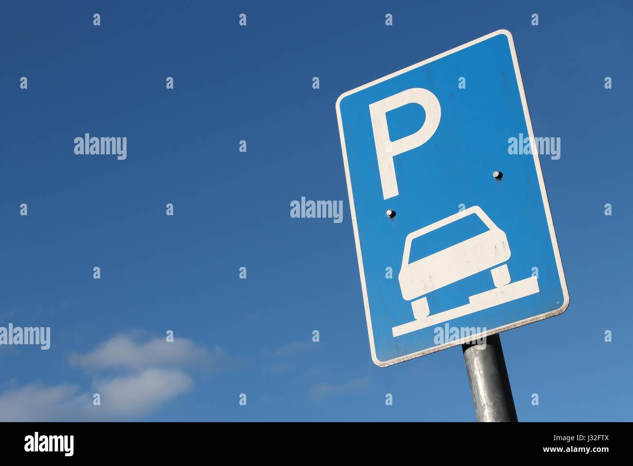 Sidewalk parking sign hi-res stock photography and images - Alamy