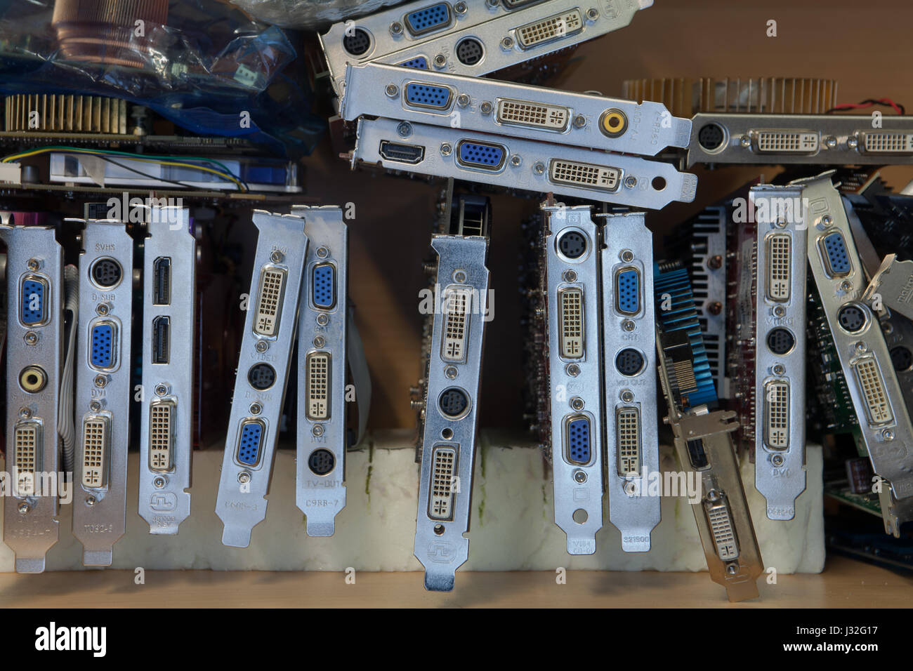 A lot of old dusty computer graphics cards Stock Photo - Alamy